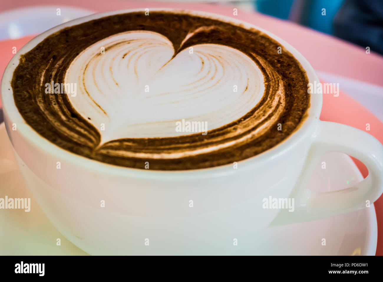 Cup of coffee, chocolate topping with white heart on top Stock Photo ...