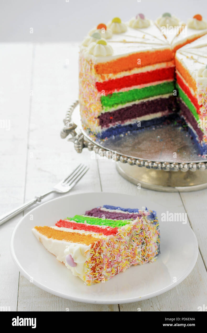 large layered rainbow cake Stock Photo - Alamy