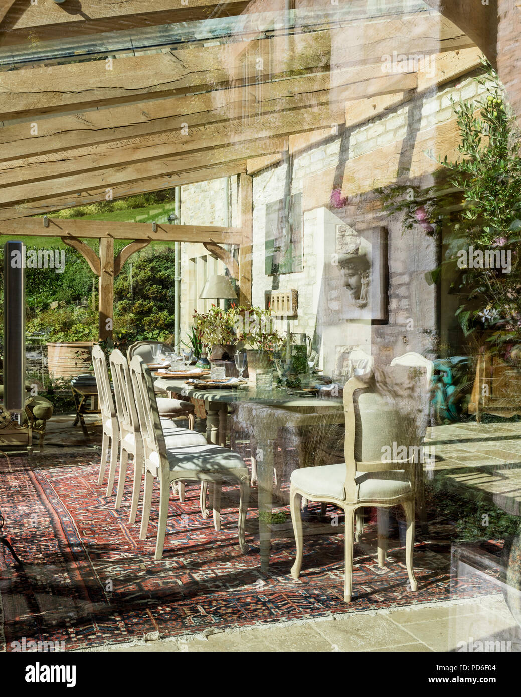 View into dining room of glass conservatory extension 19th century ...