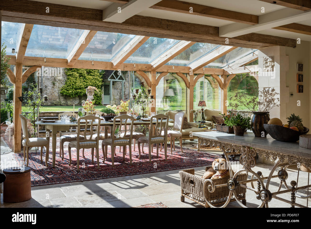 glass conservaory extension. Spacious dining room interior in glass ...