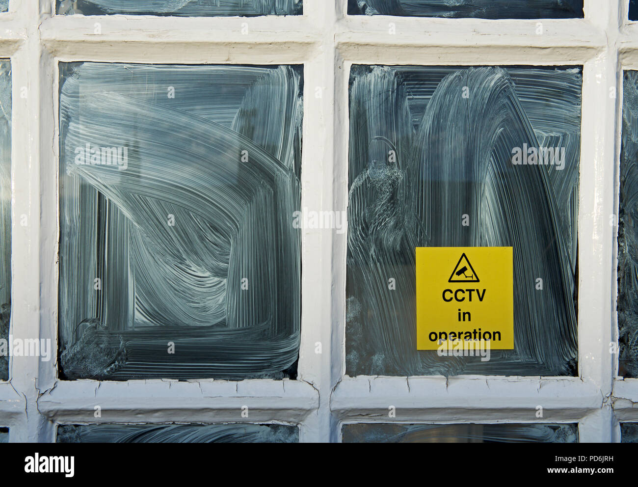 Sign - CCTV in operation - on shop window, England UK Stock Photo - Alamy