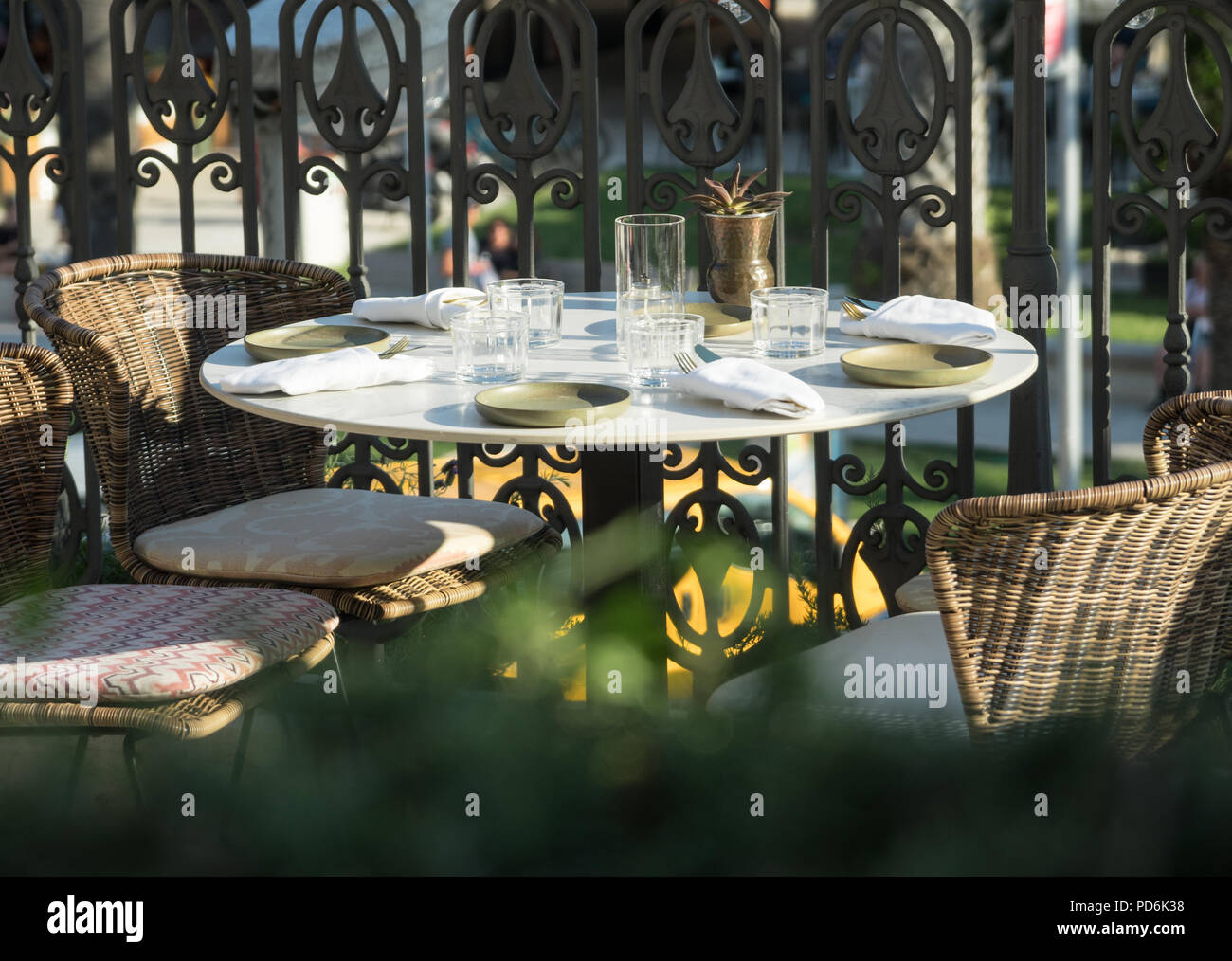 Served table for four persons in restaurant at summer Stock Photo - Alamy
