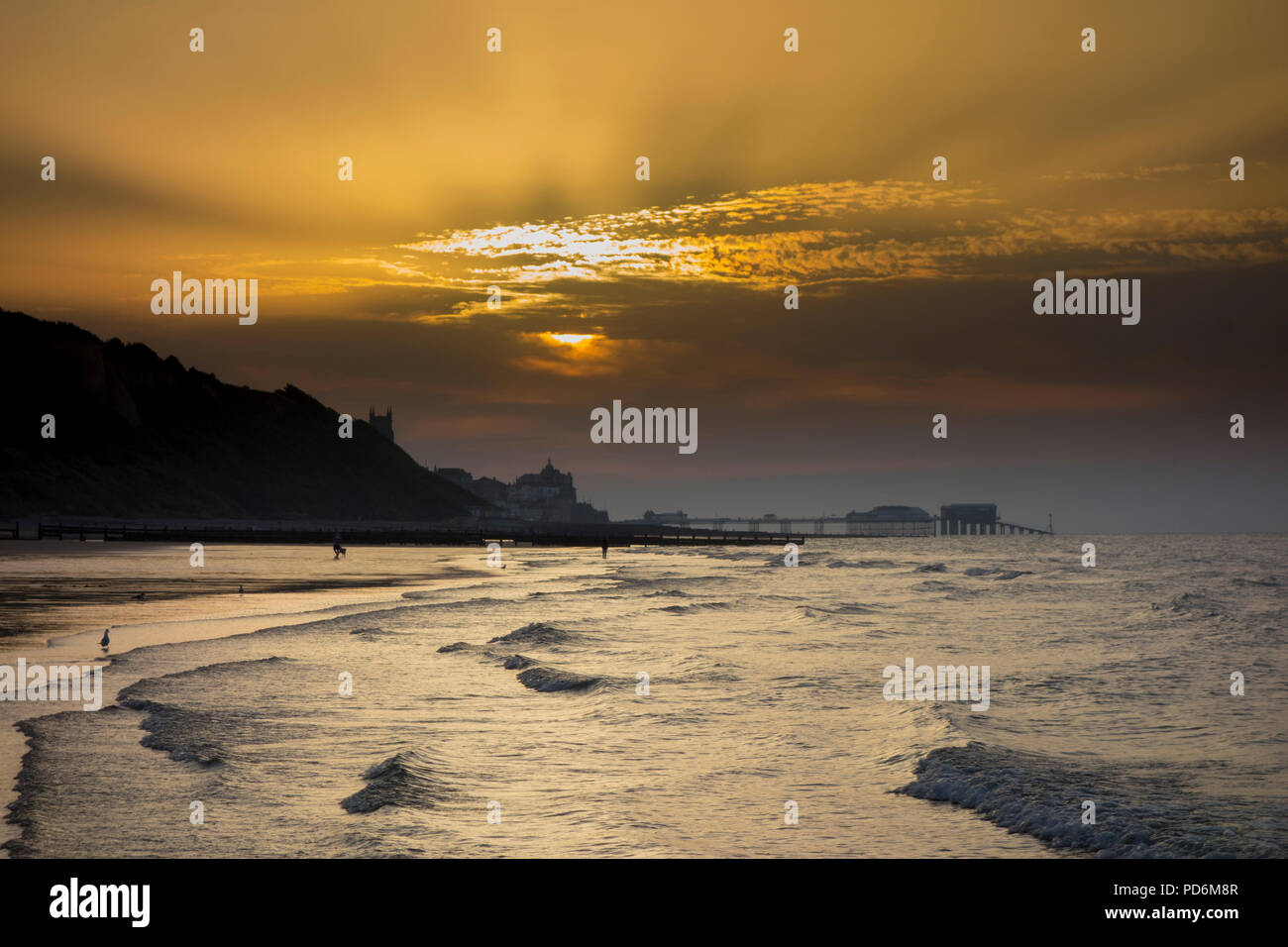 Cromer beach sunset Stock Photo - Alamy