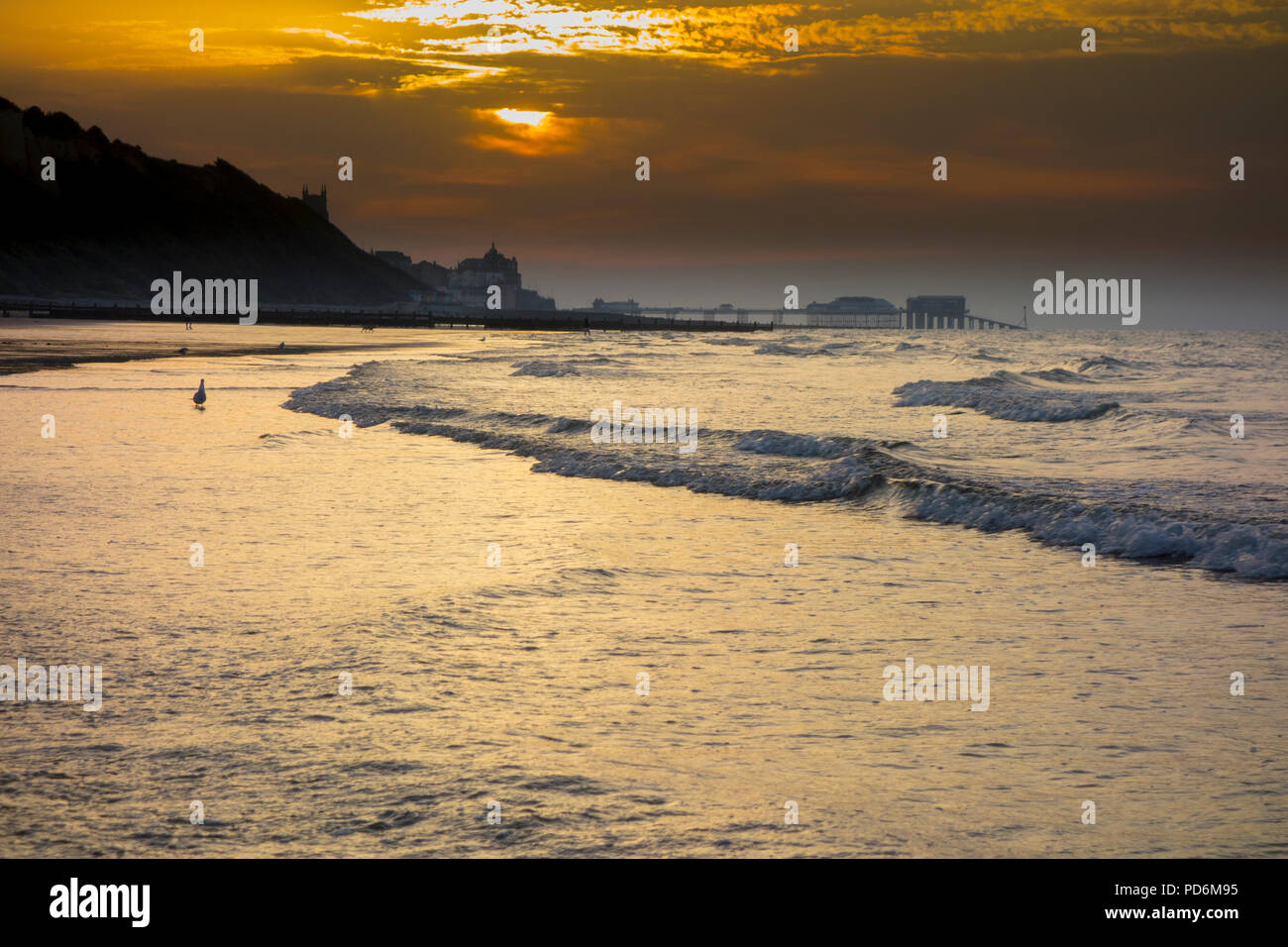 Cromer beach sunset Stock Photo - Alamy