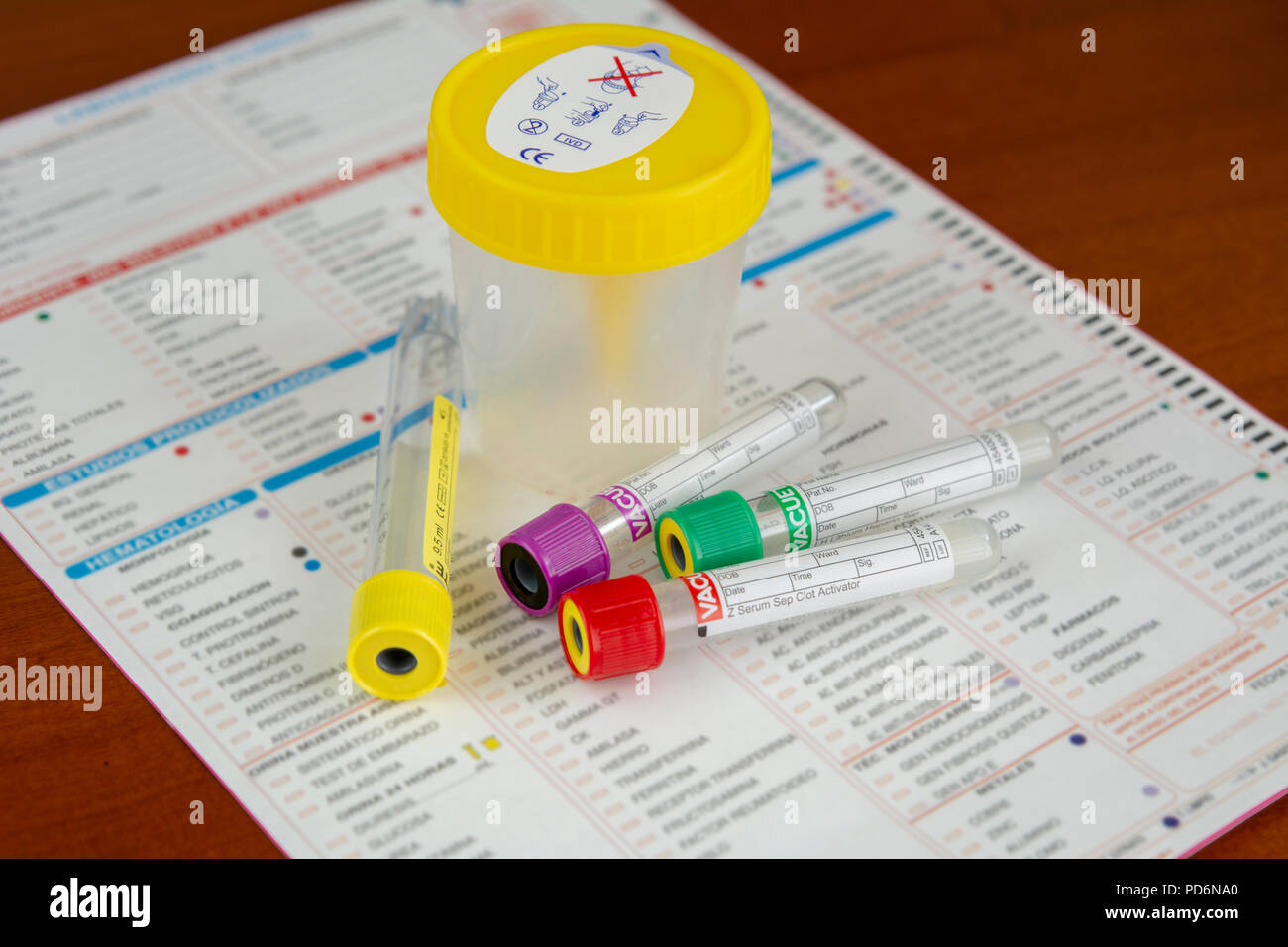 Â laboratory work table with report and tubes to collect samples for ...