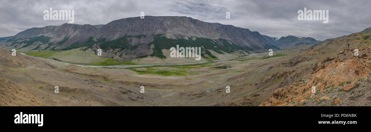A picturesque panorama from top on a winding river in the valley ...