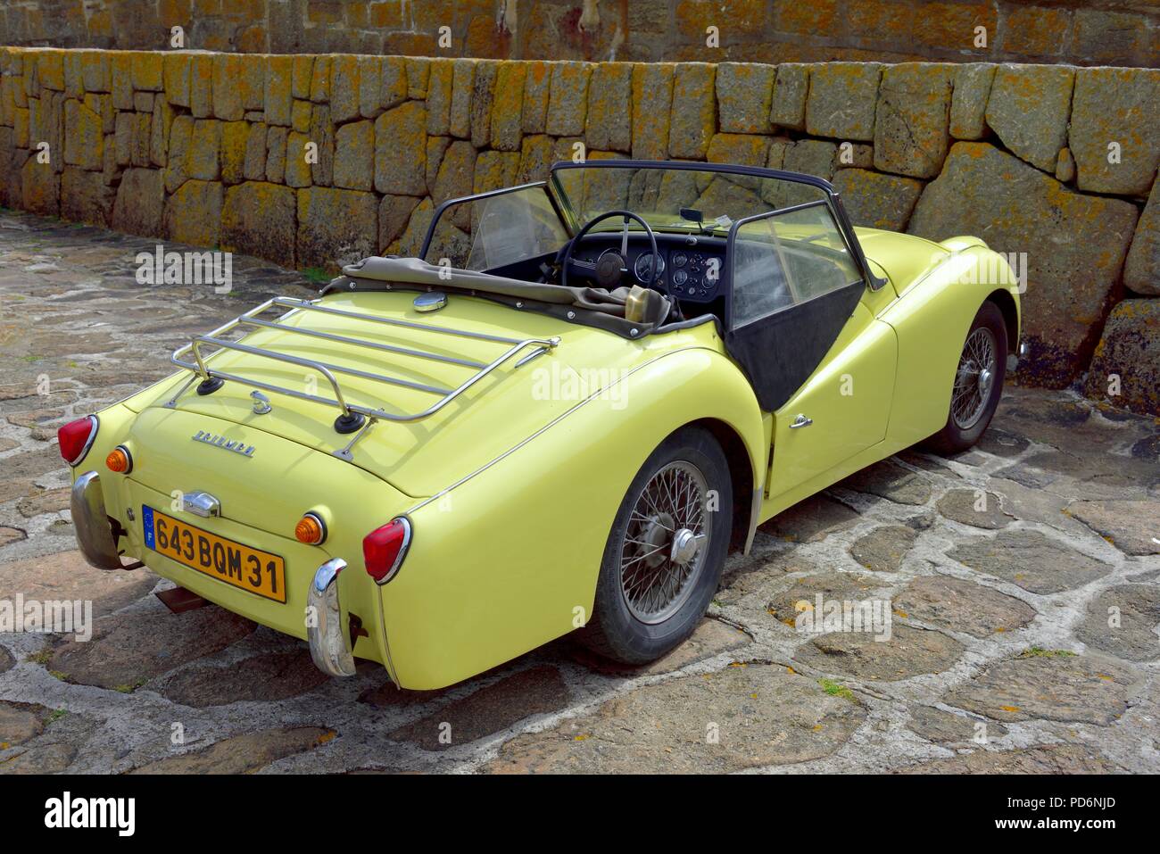 Yellow Triumph TR3 parked in Mousehole,Cornwall,England,UK Stock Photo ...