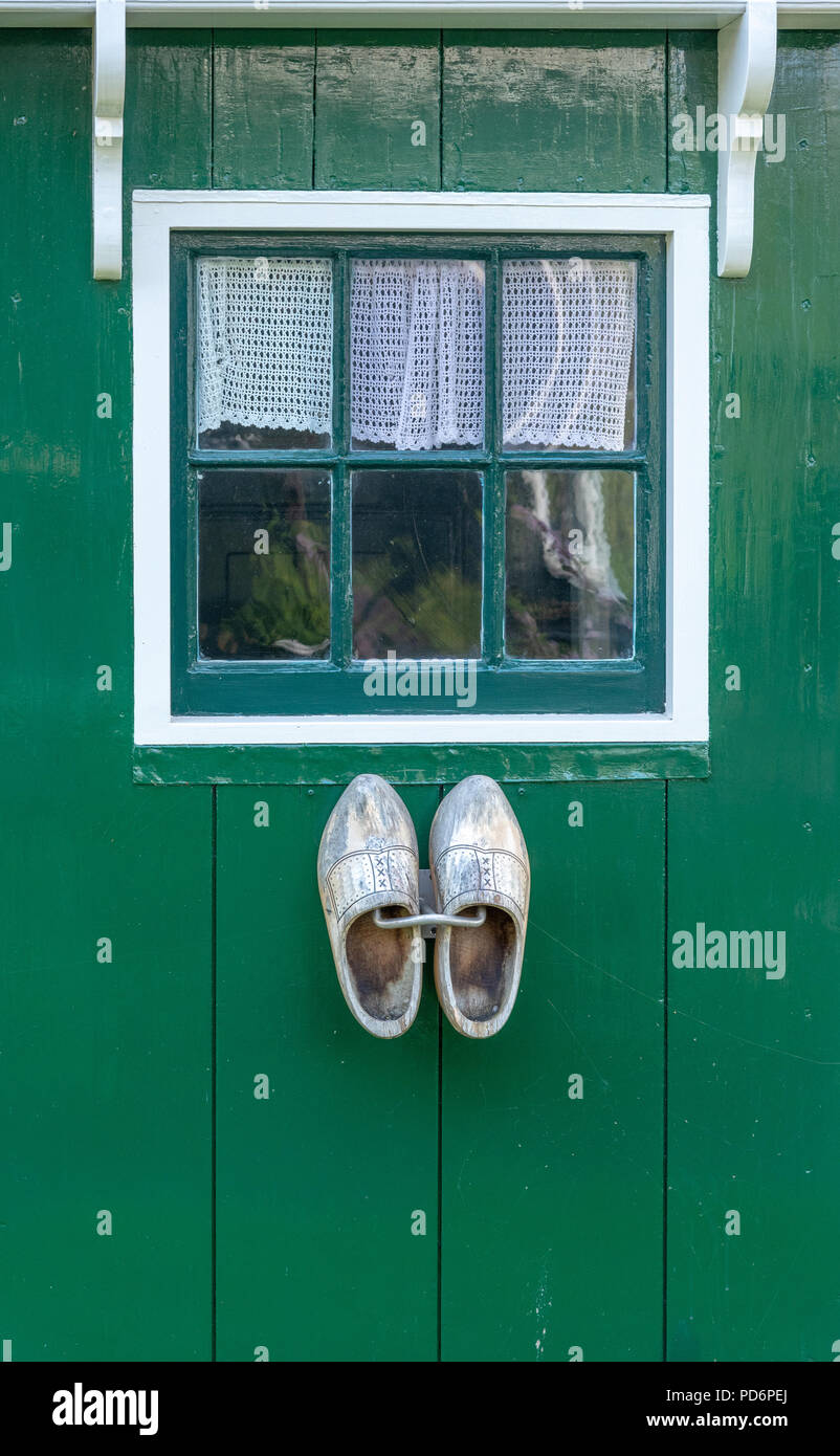 typical dutch window with wooden clogs Stock Photo - Alamy