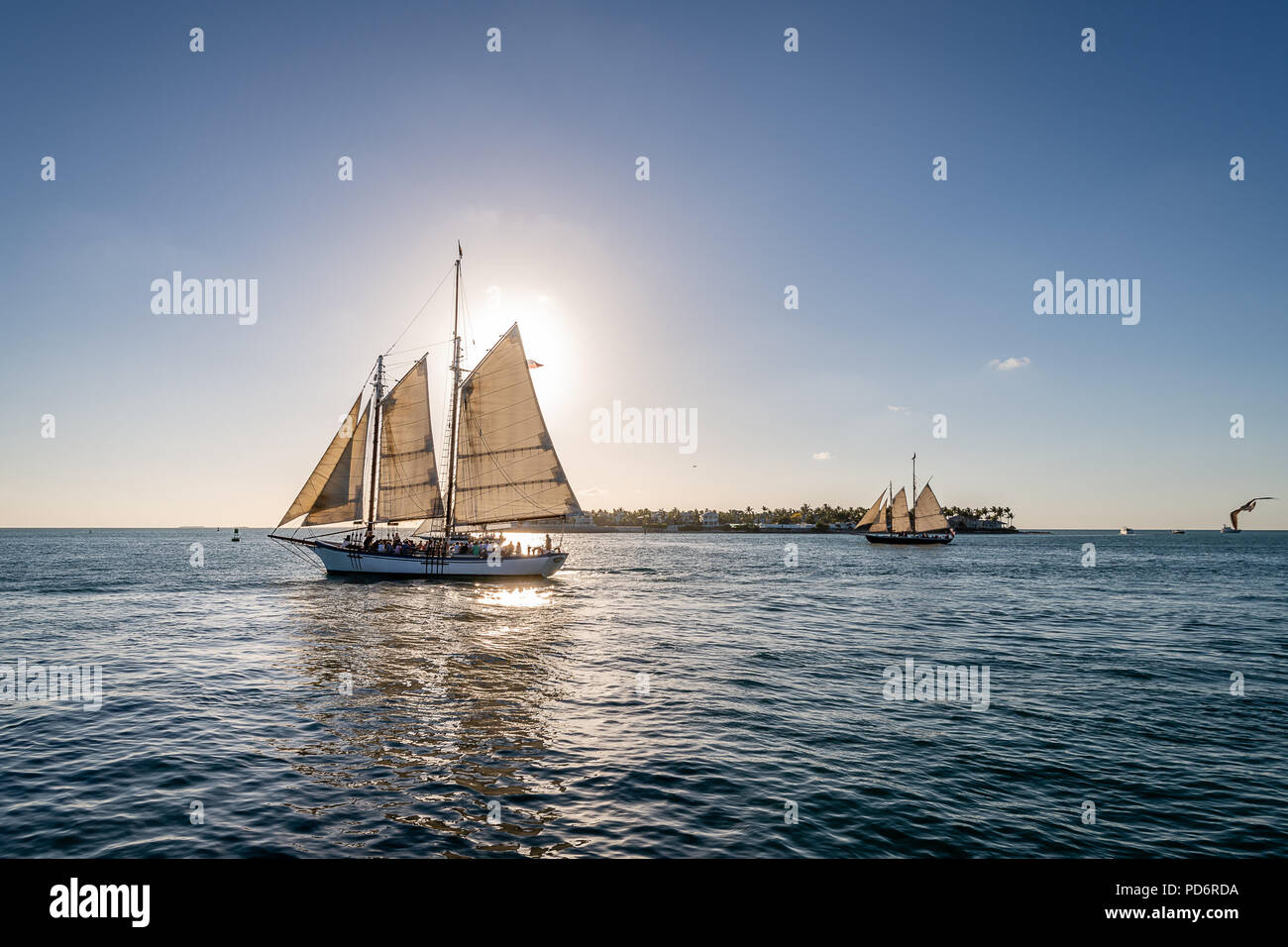 Ships at Sunset Stock Photo - Alamy
