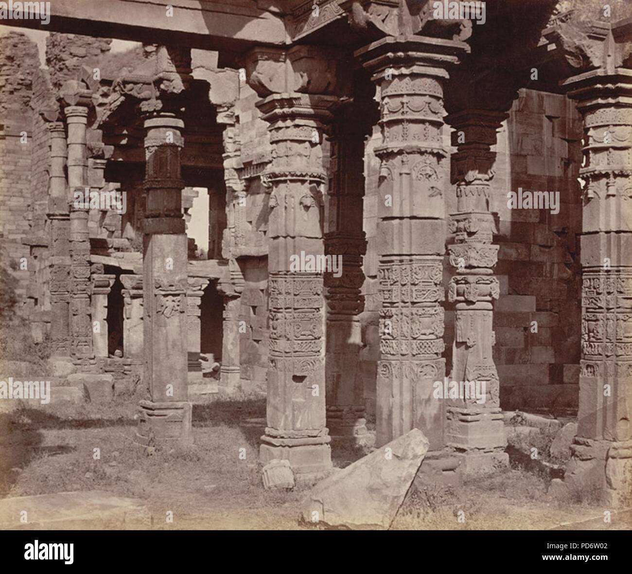 An 1860 photo showing columns of the Quwwat-ul-Islam mosque made from ...