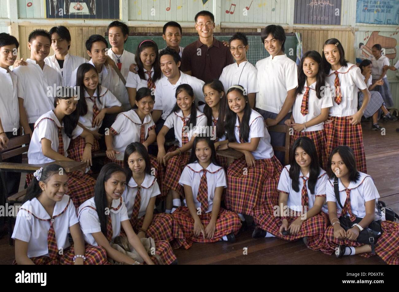 An Education Volunteer with his high school students in the Philippines ...