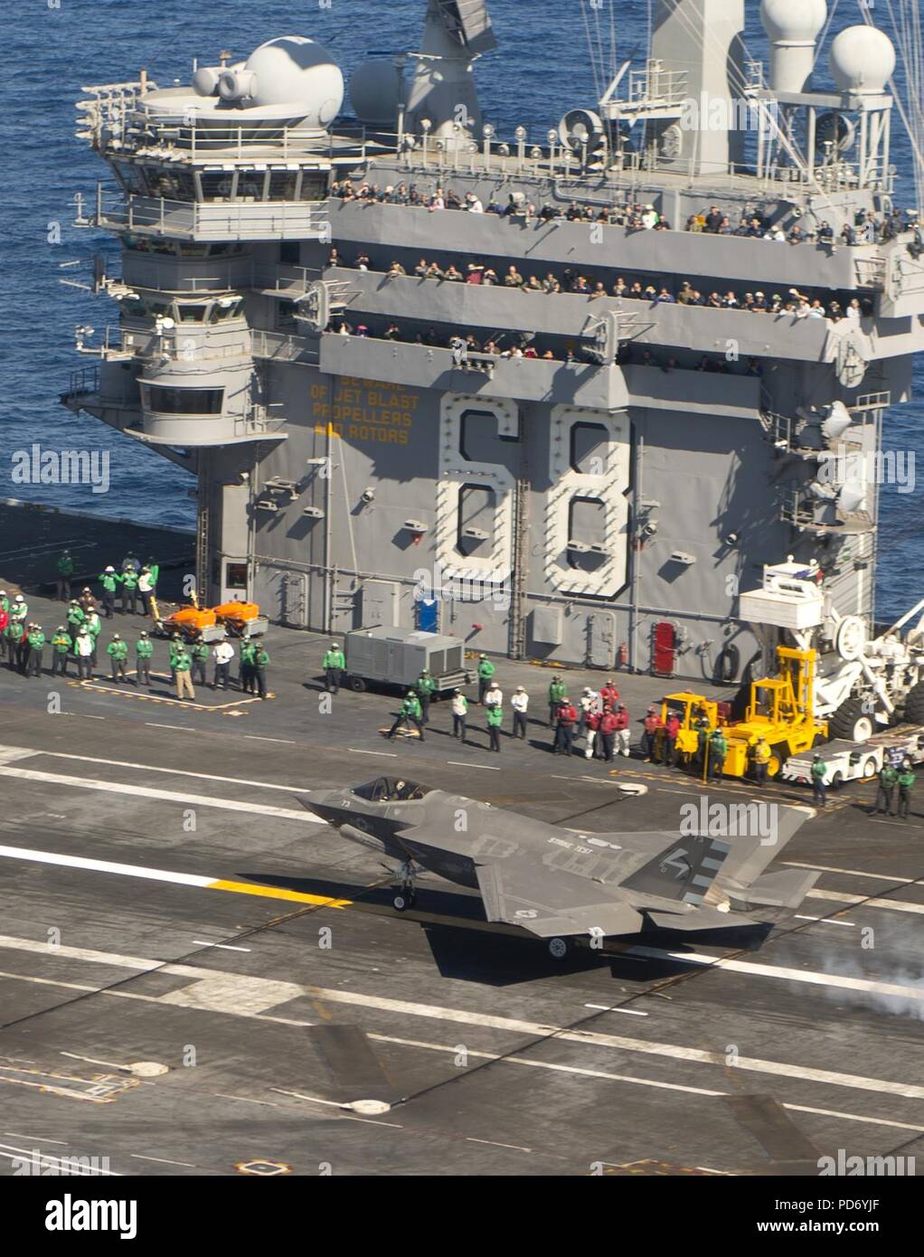 An F-35C Lightning II lands aboard USS Nimitz. (15090445214 Stock Photo ...