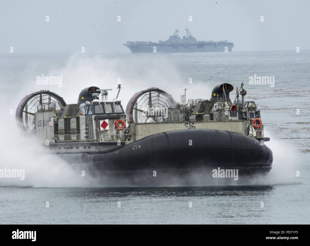 An LCAC conducts amphibious assault training. (9135941556 Stock Photo ...