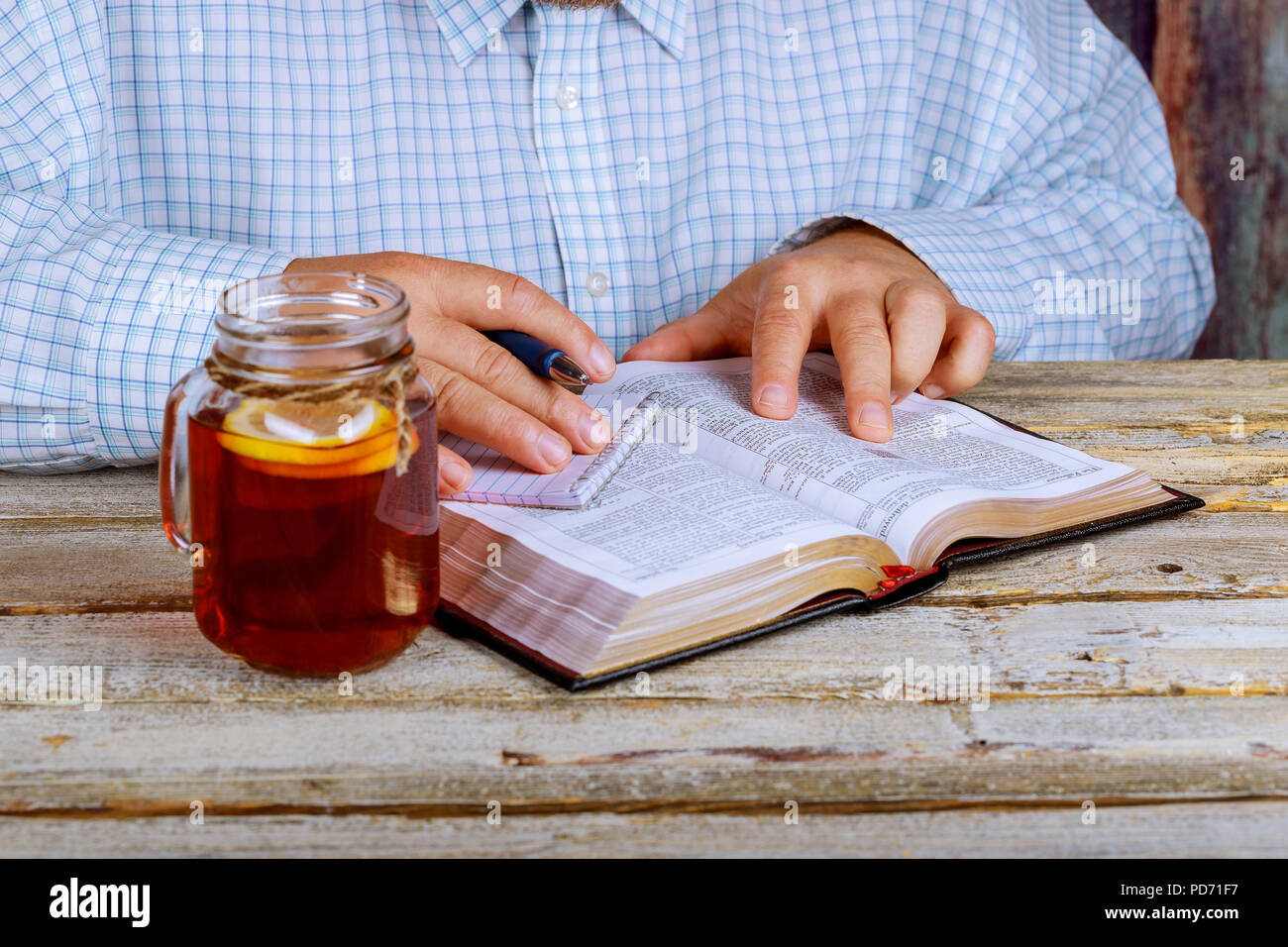 Christian man reading for bible study hi-res stock photography and ...