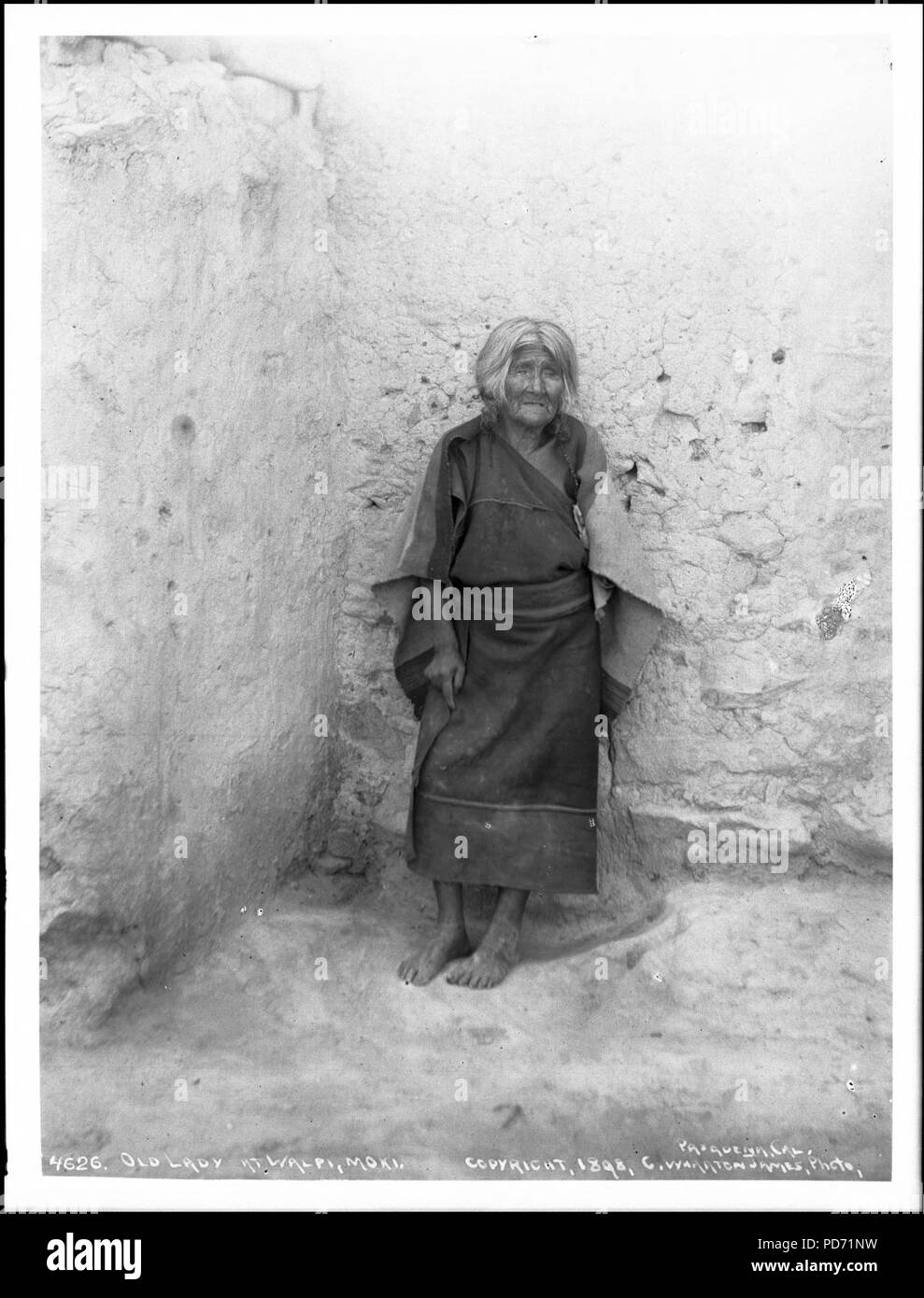 An old Hopi (Moki) woman at the pueblo of Walpi (Walpai), Arizona, ca ...