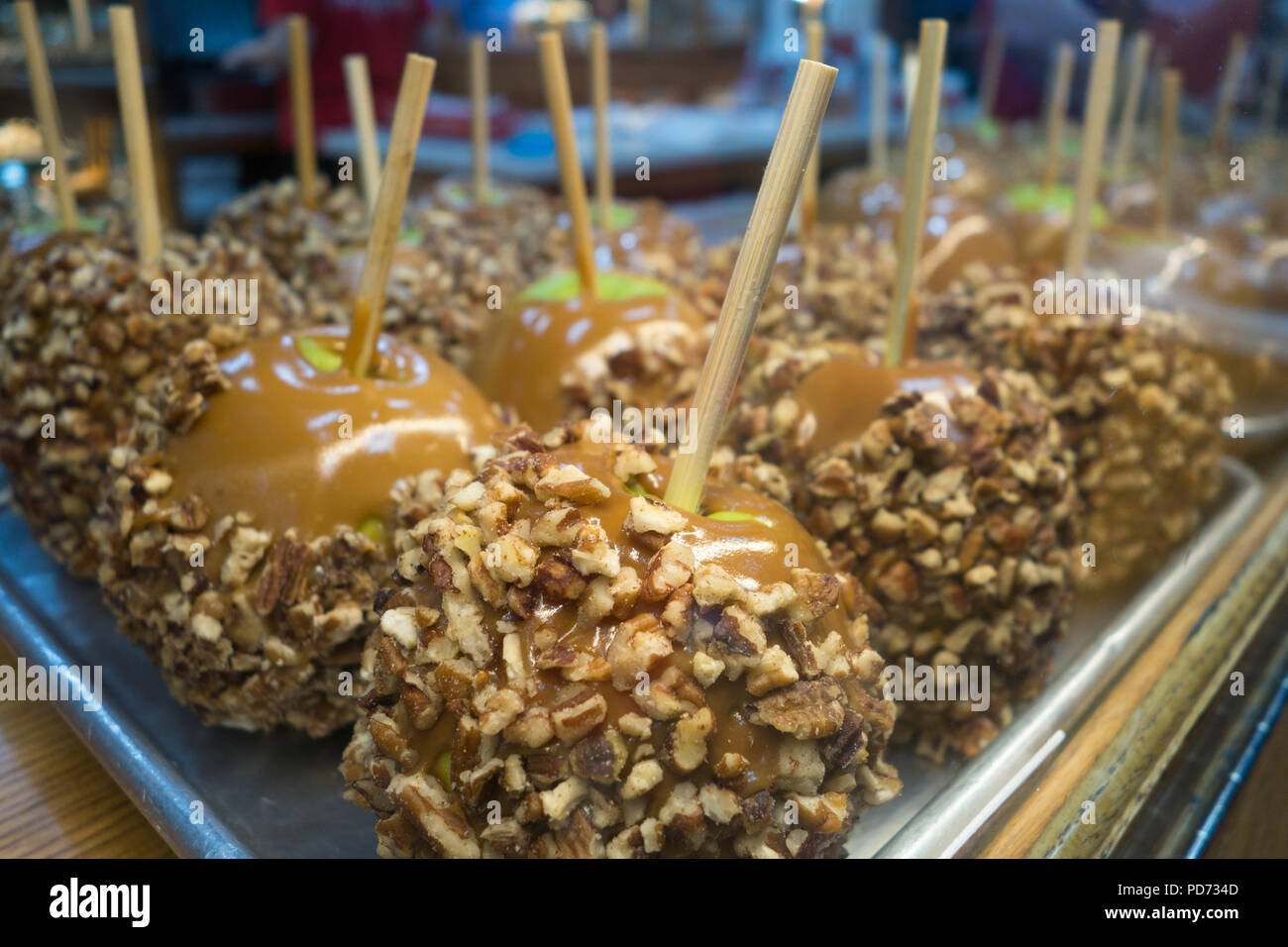 A large tray of candy apples Stock Photo - Alamy