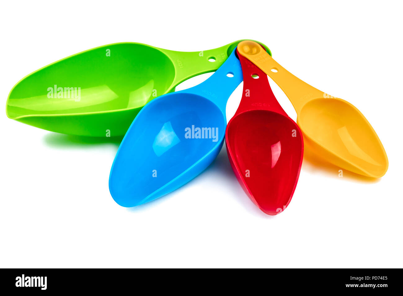 Set of colorful plastic measuring spoon isolated on white background ...