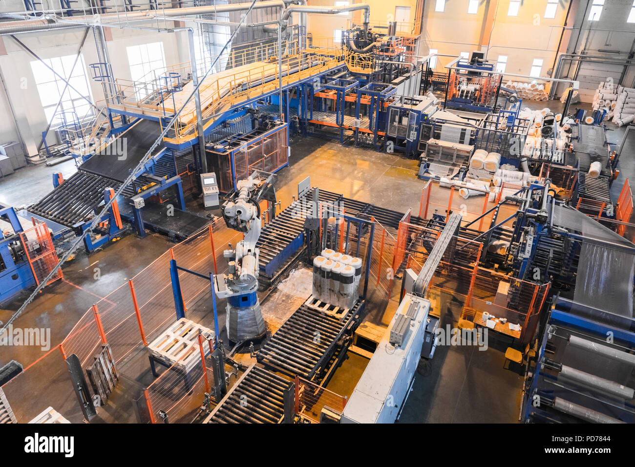 Fiberglass production industry equipment at manufacture background ...