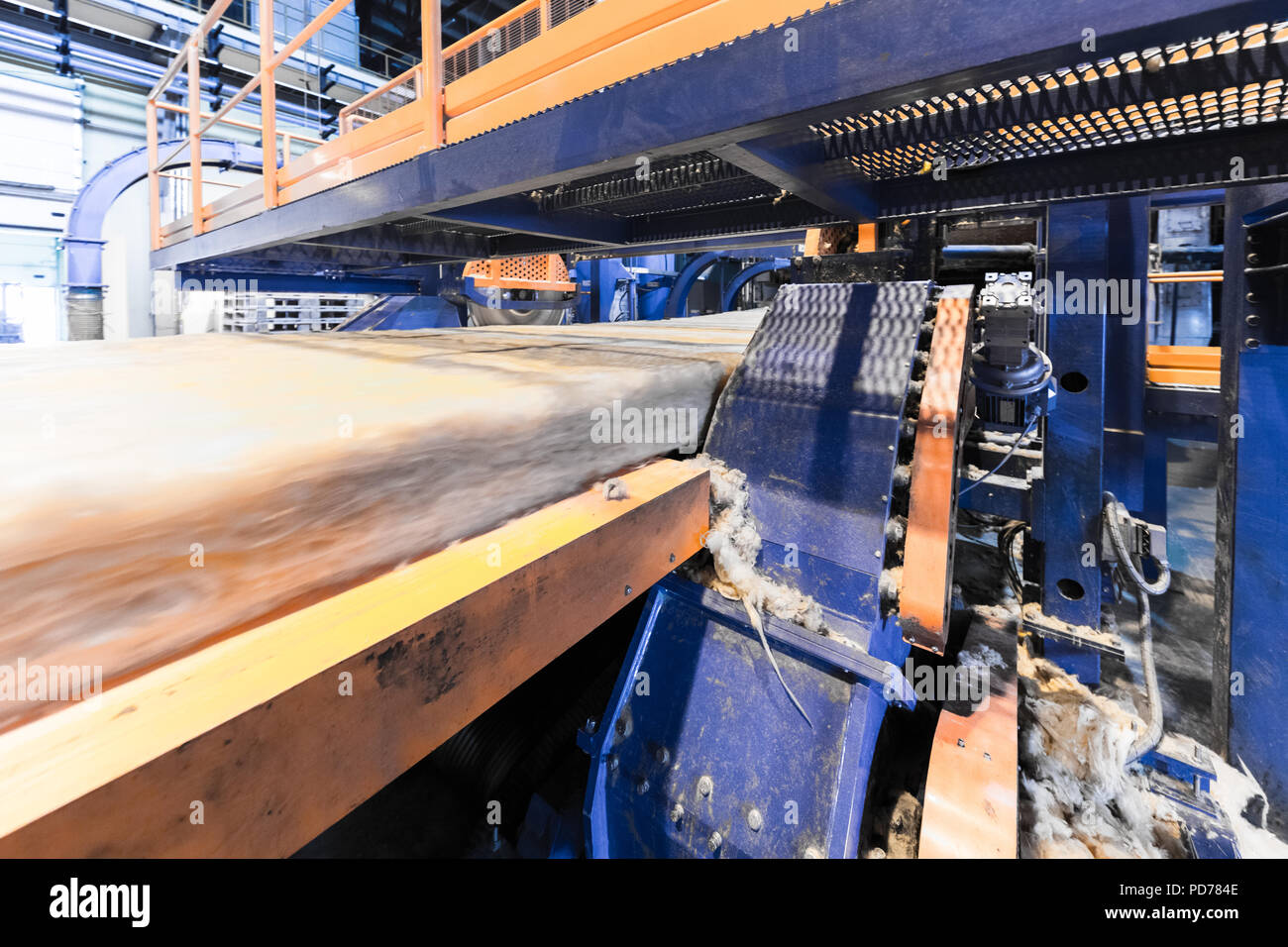 Fiberglass production industry equipment at manufacture background ...