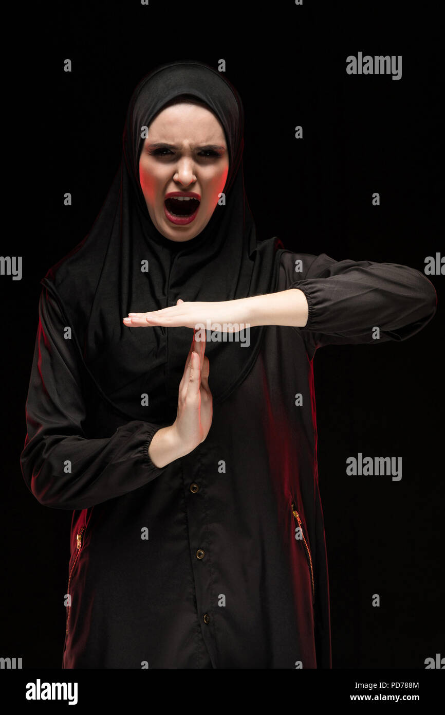 Portrait of beautiful desperate scared frightened young muslim woman ...