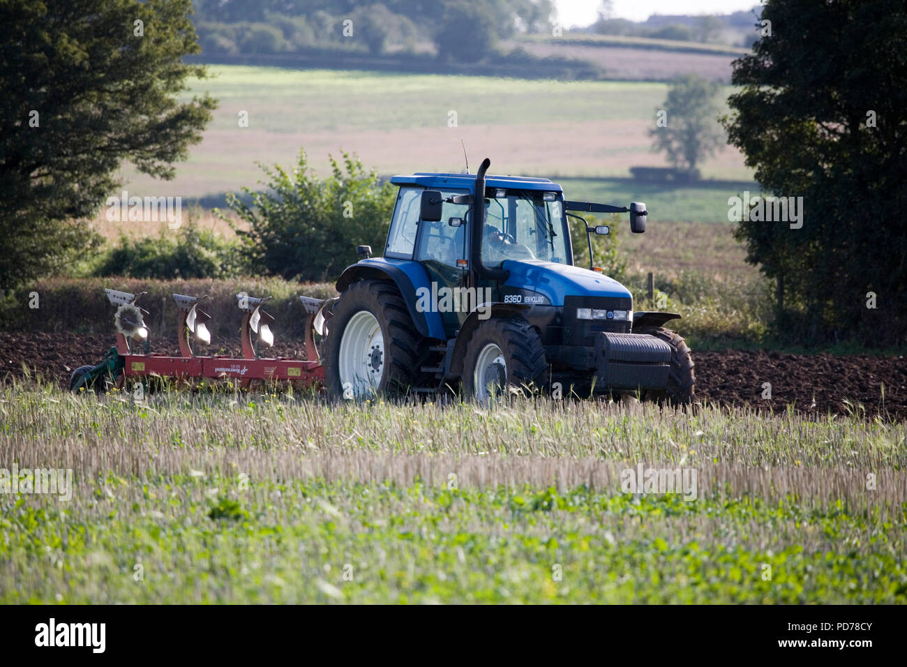 New Holland 8360 tractor Ploughing Stock Photo - Alamy