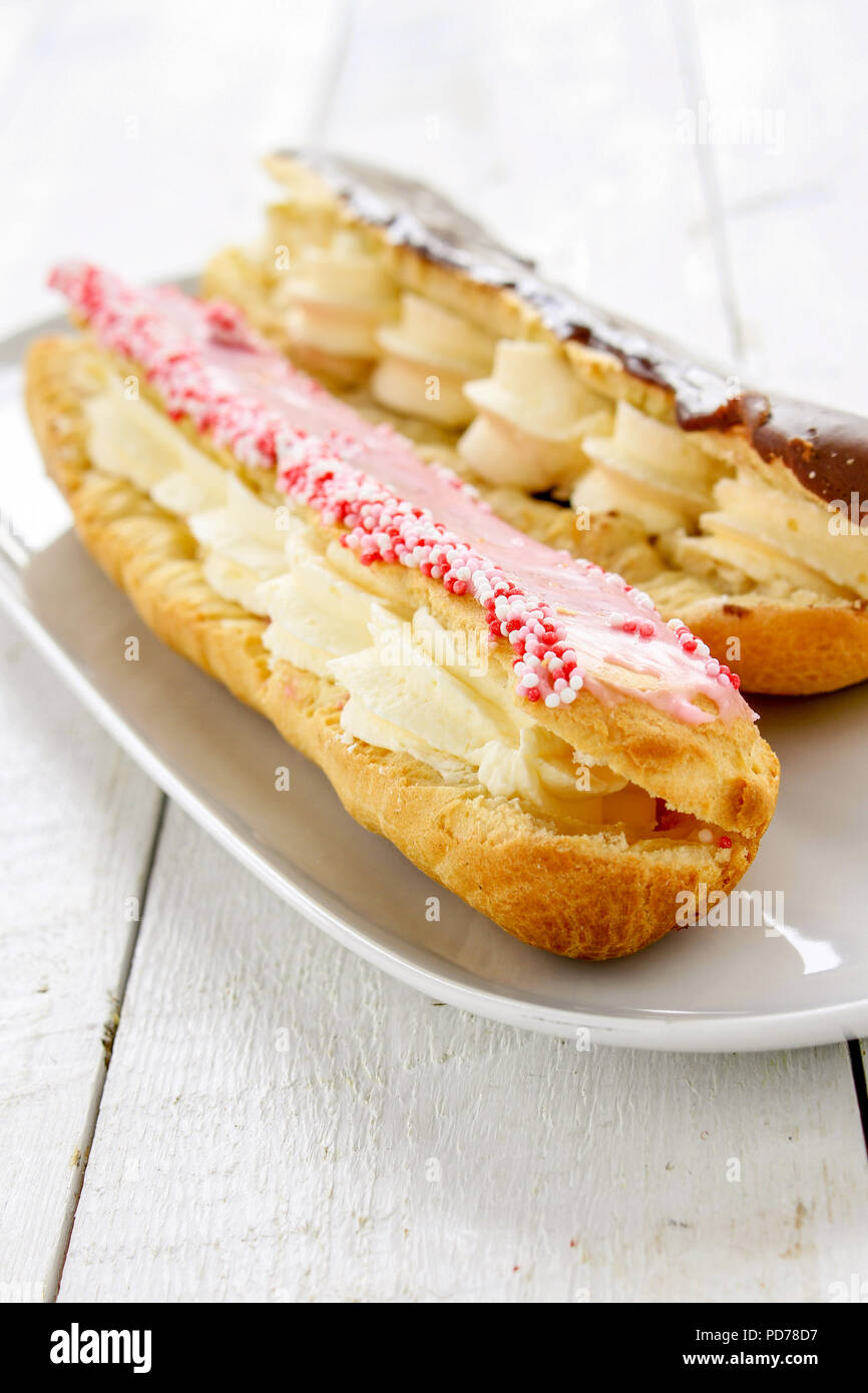 larger chocolate eclair pastries Stock Photo - Alamy