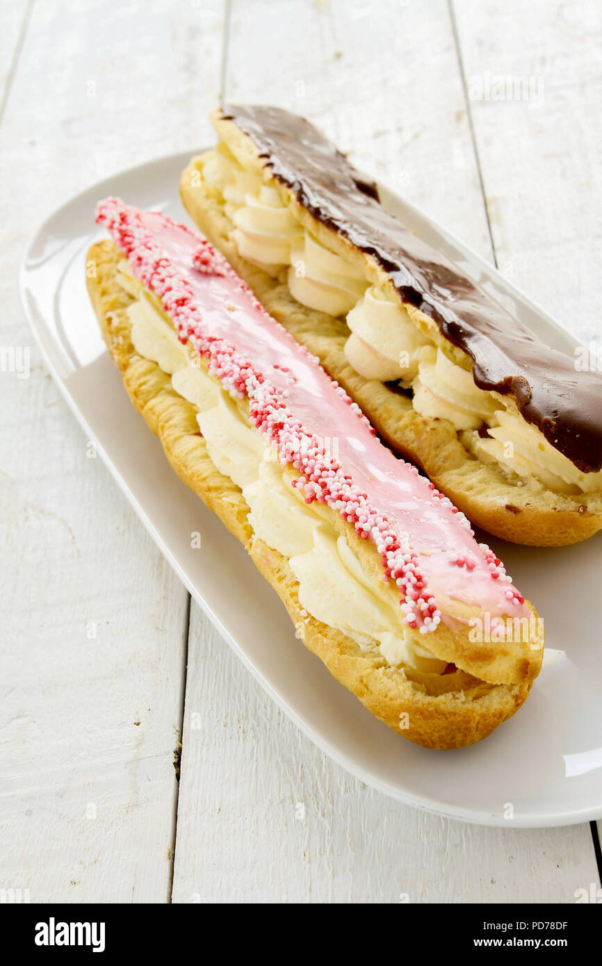larger chocolate eclair pastries Stock Photo - Alamy
