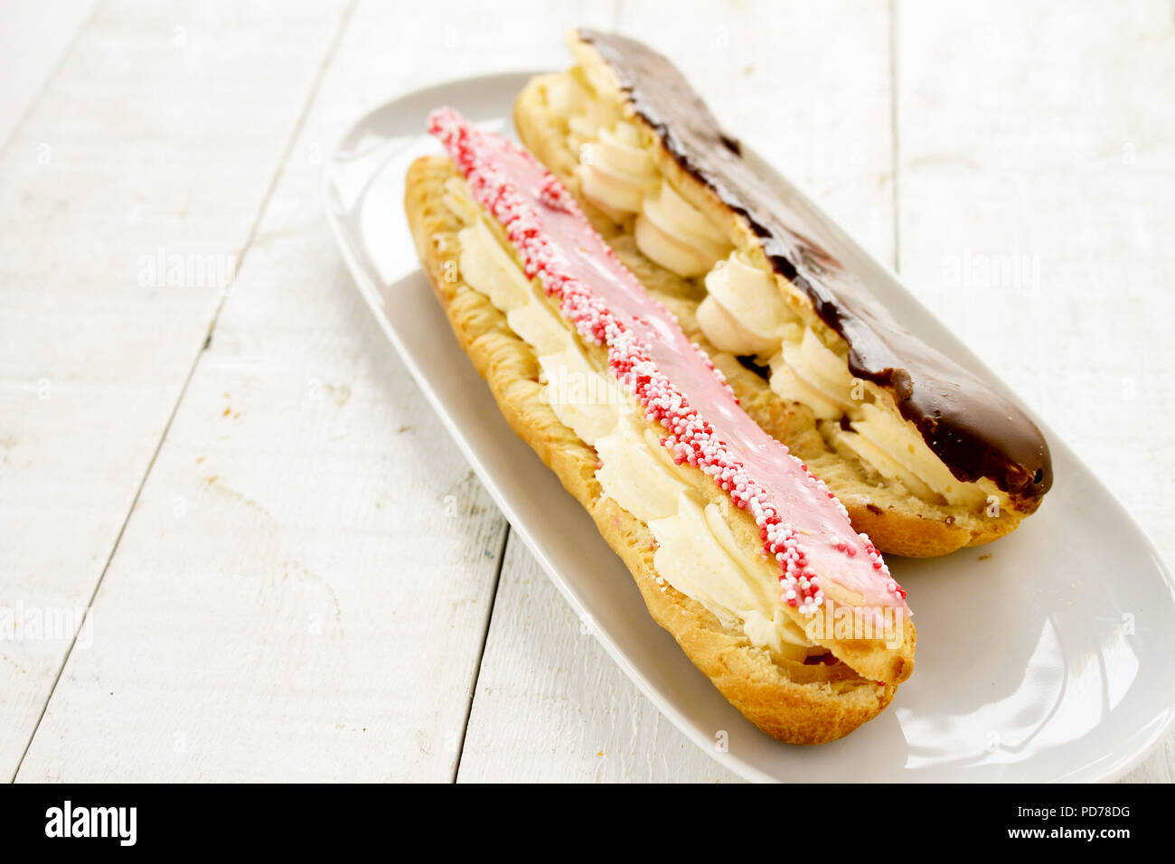larger chocolate eclair pastries Stock Photo - Alamy