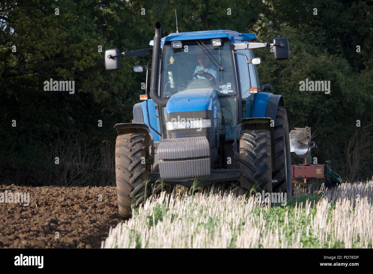 New Holland 8360 tractor Ploughing Stock Photo - Alamy