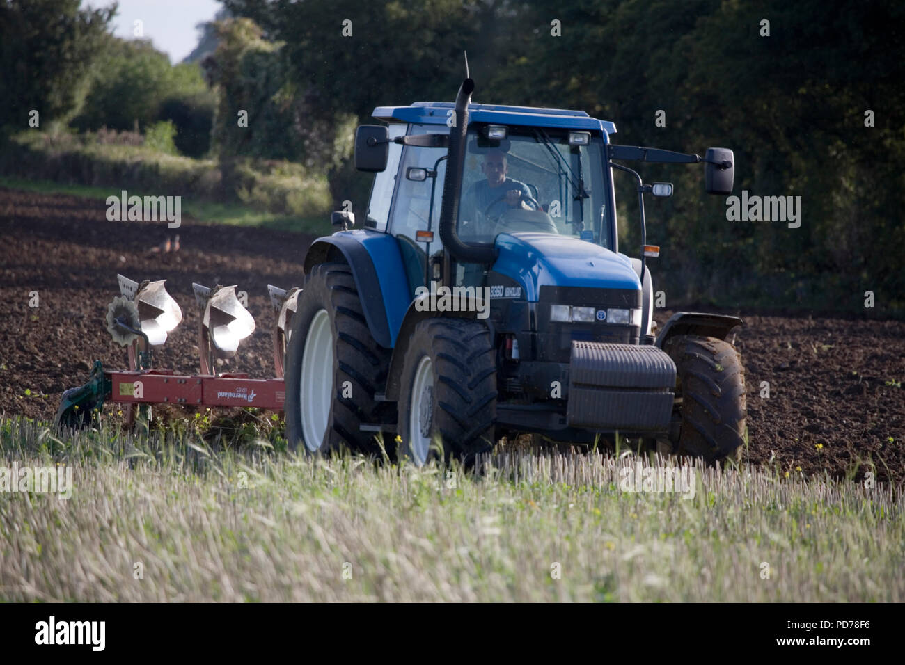 New Holland 8360 tractor Ploughing Stock Photo - Alamy