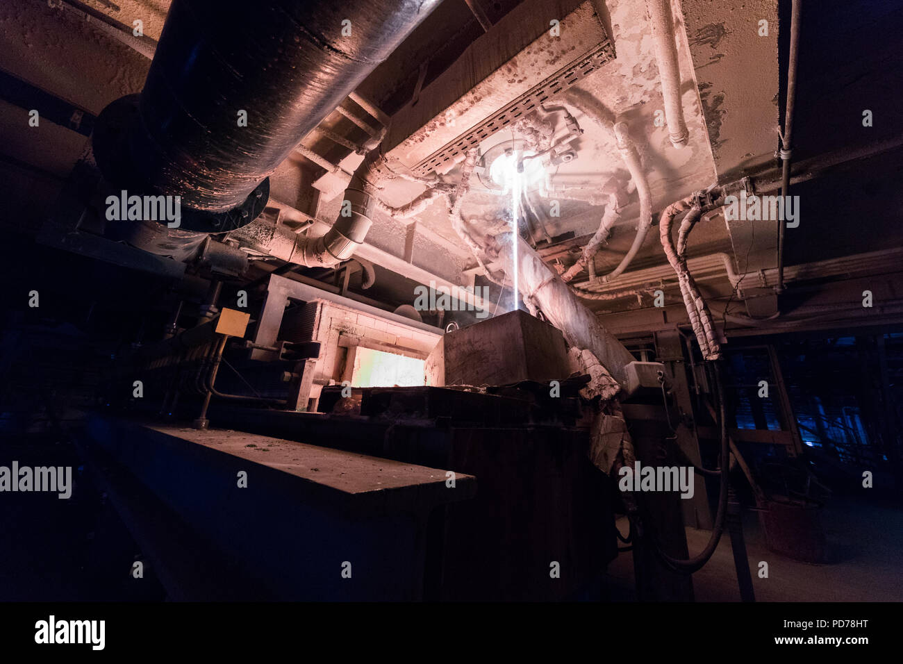 Process of fiberglass production at manufacture background with ...