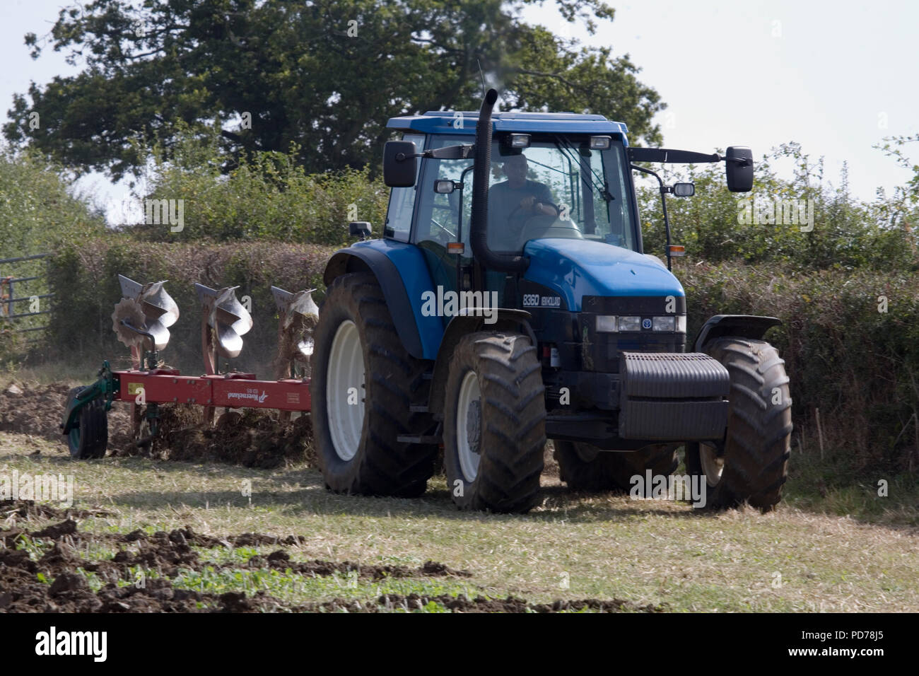 New Holland 8360 tractor Ploughing Stock Photo - Alamy