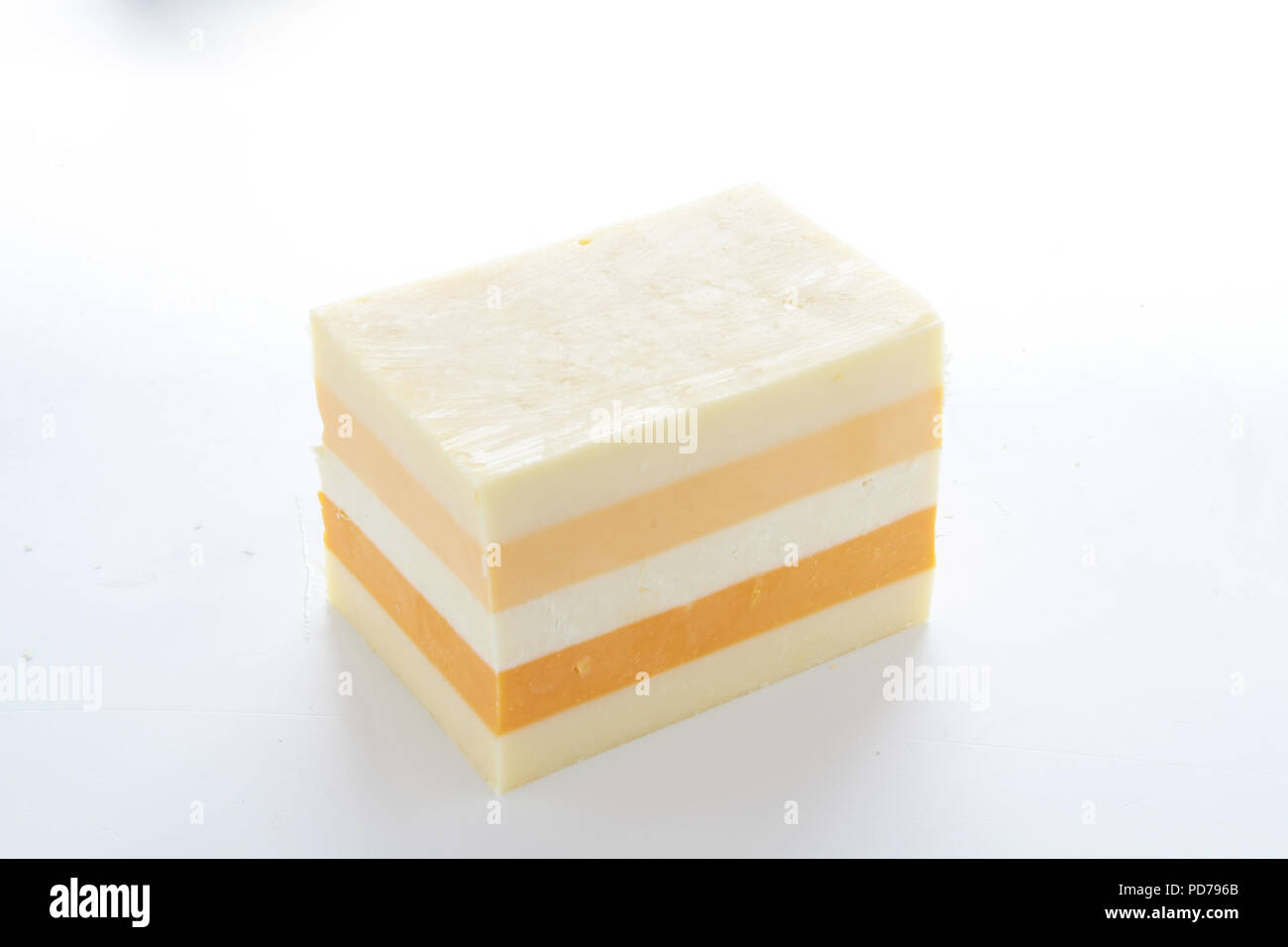 cheese portion isolated on white background Stock Photo - Alamy