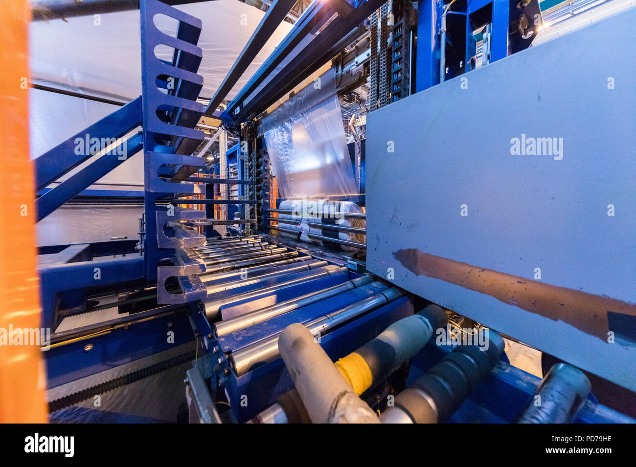 Fiberglass production industry equipment at manufacture background ...