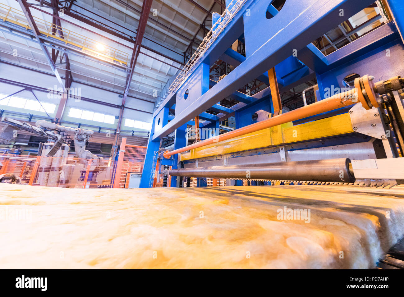 Fiberglass production industry equipment at manufacture background ...