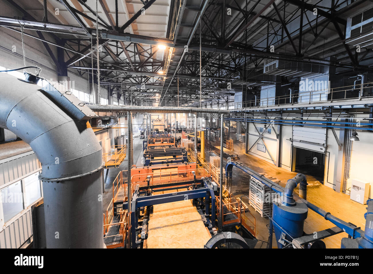 Fiberglass production industry equipment at manufacture background ...