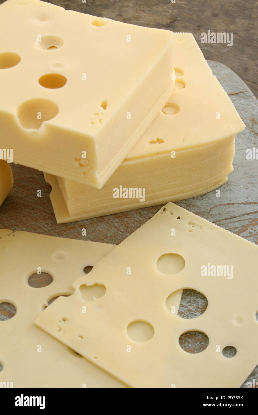 sliced cheese portions Stock Photo - Alamy