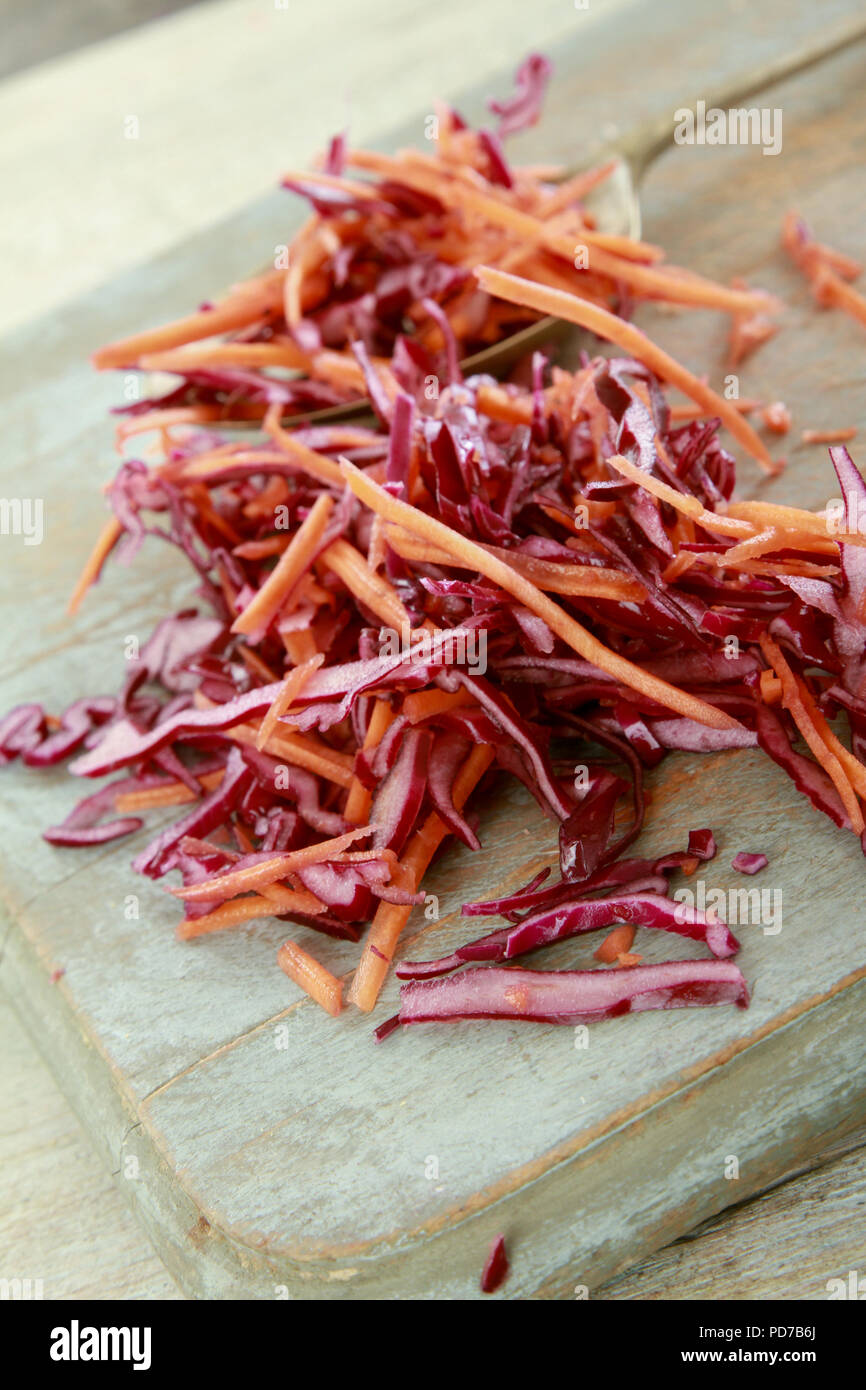making vegetable coleslaw Stock Photo - Alamy