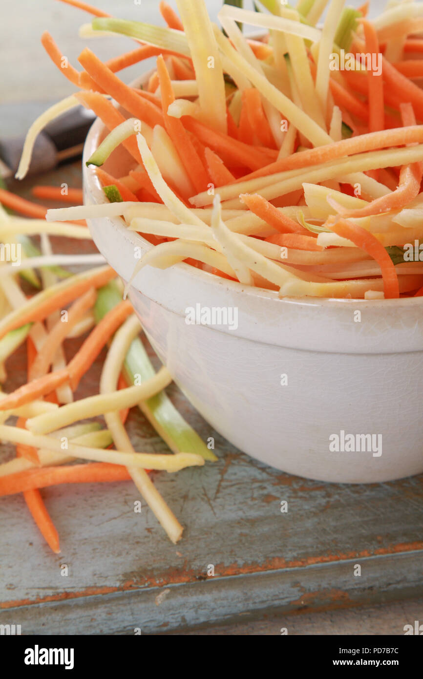 making vegetable coleslaw Stock Photo - Alamy
