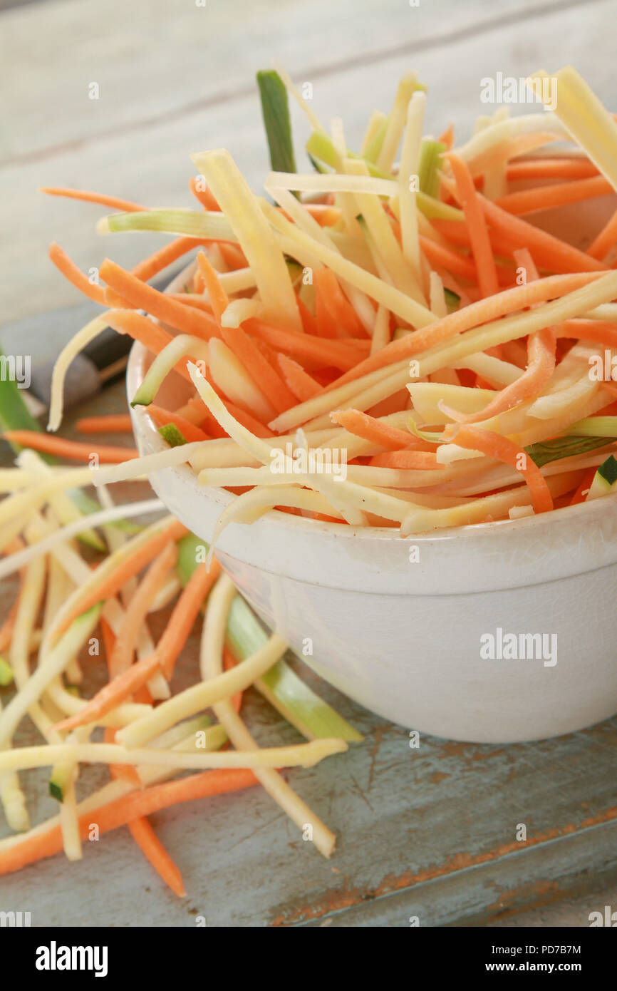 making vegetable coleslaw Stock Photo - Alamy