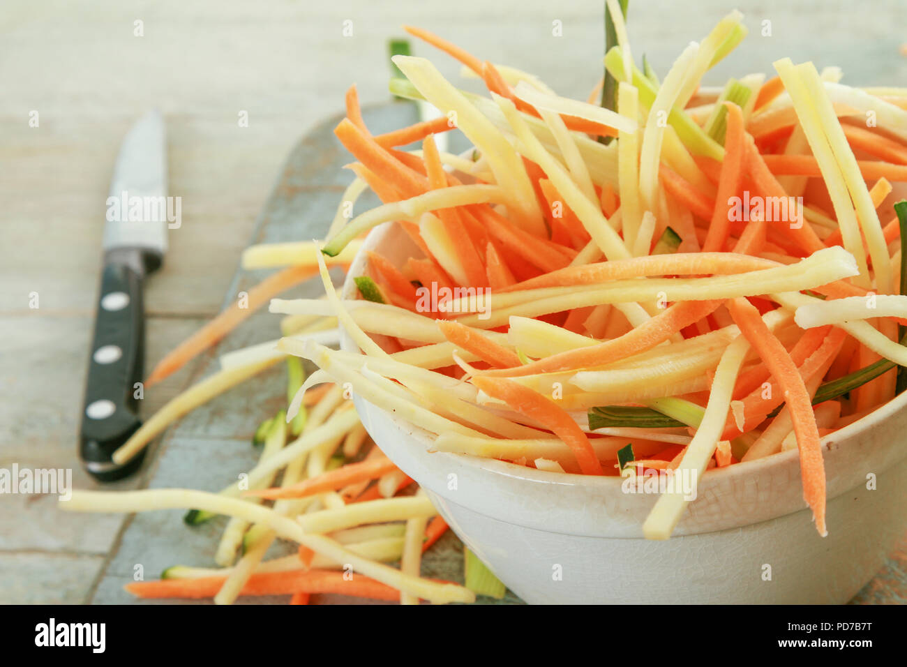 making vegetable coleslaw Stock Photo - Alamy