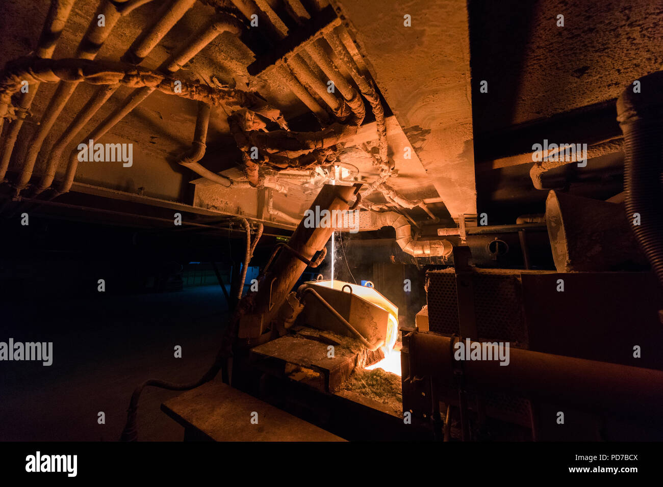 Process of fiberglass production at manufacture background with ...