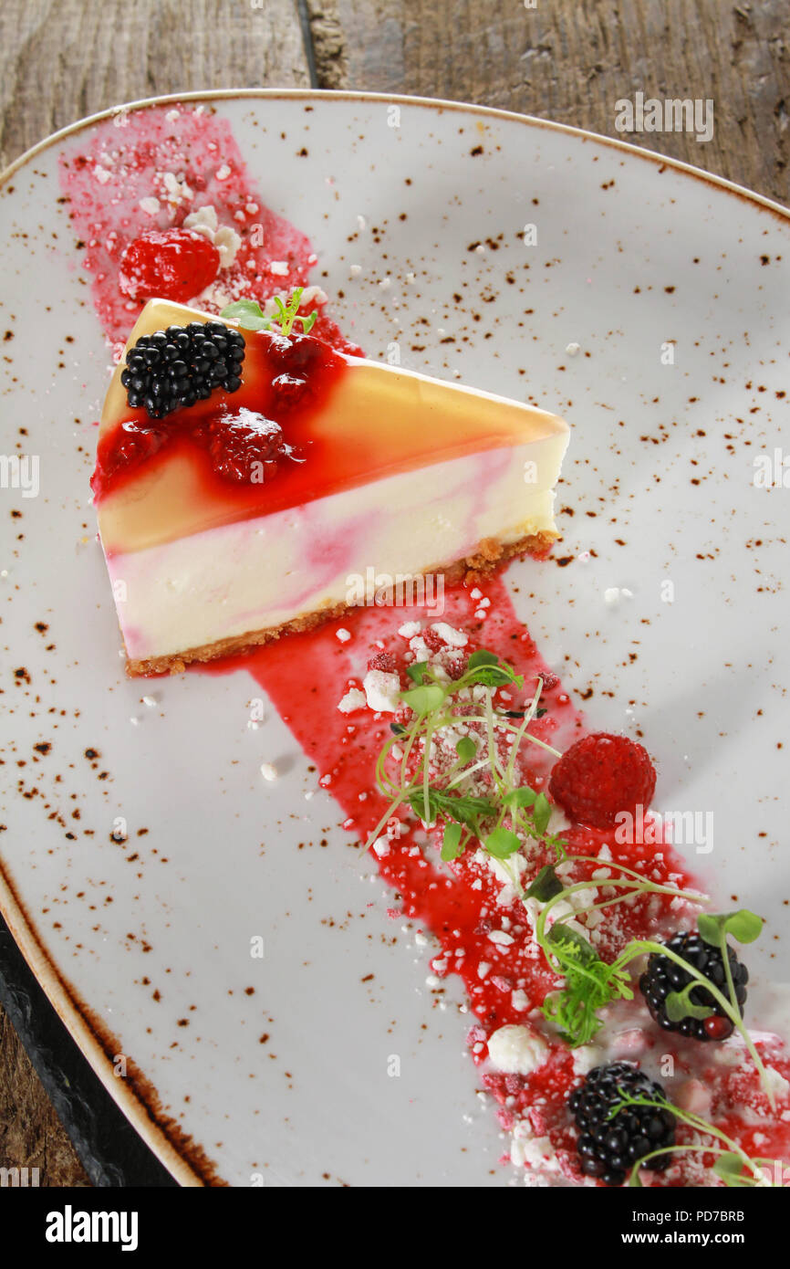 cheese cake plated dessert Stock Photo - Alamy