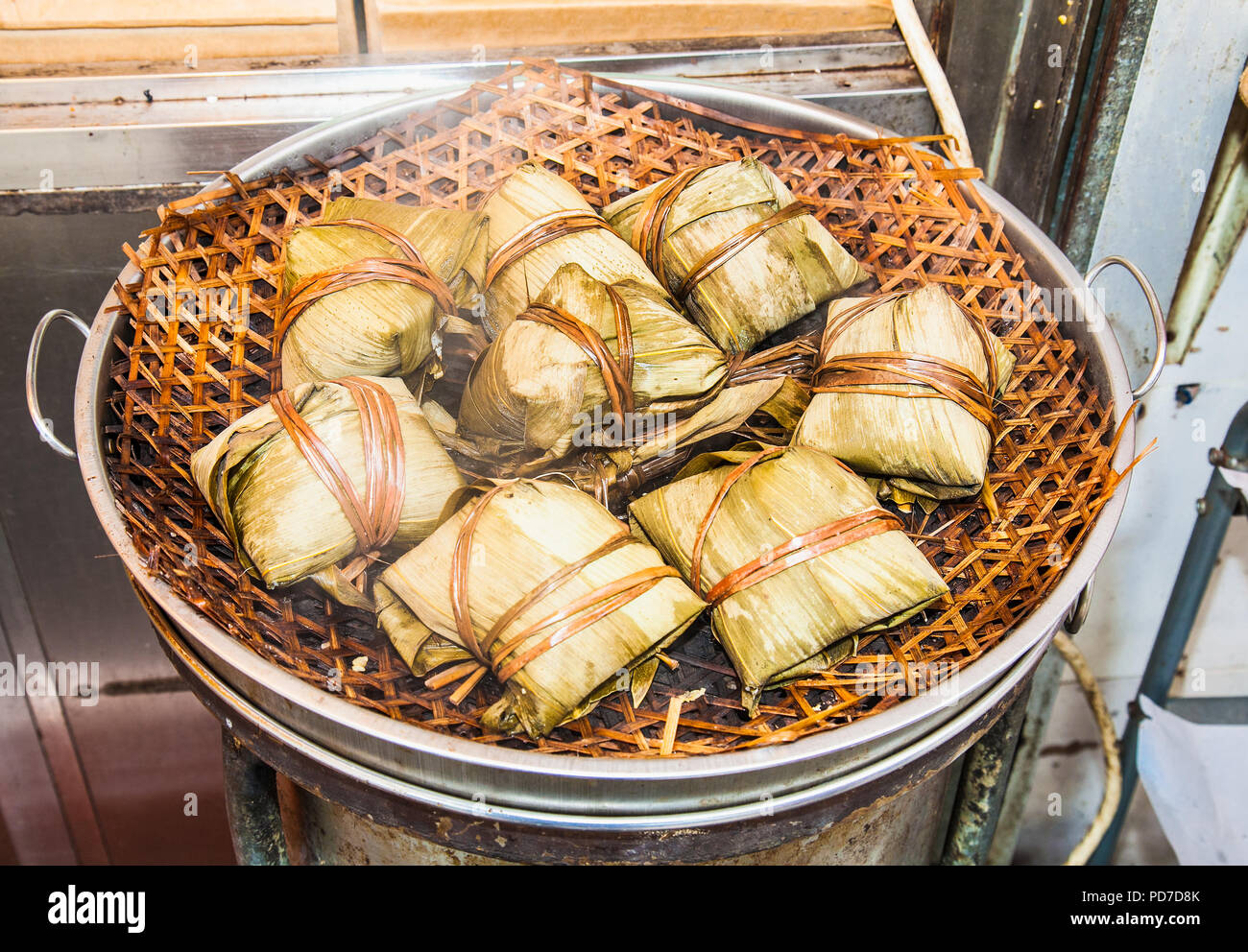 Banana leaves wrap steam rice on street food in Hong Kong Stock Photo ...