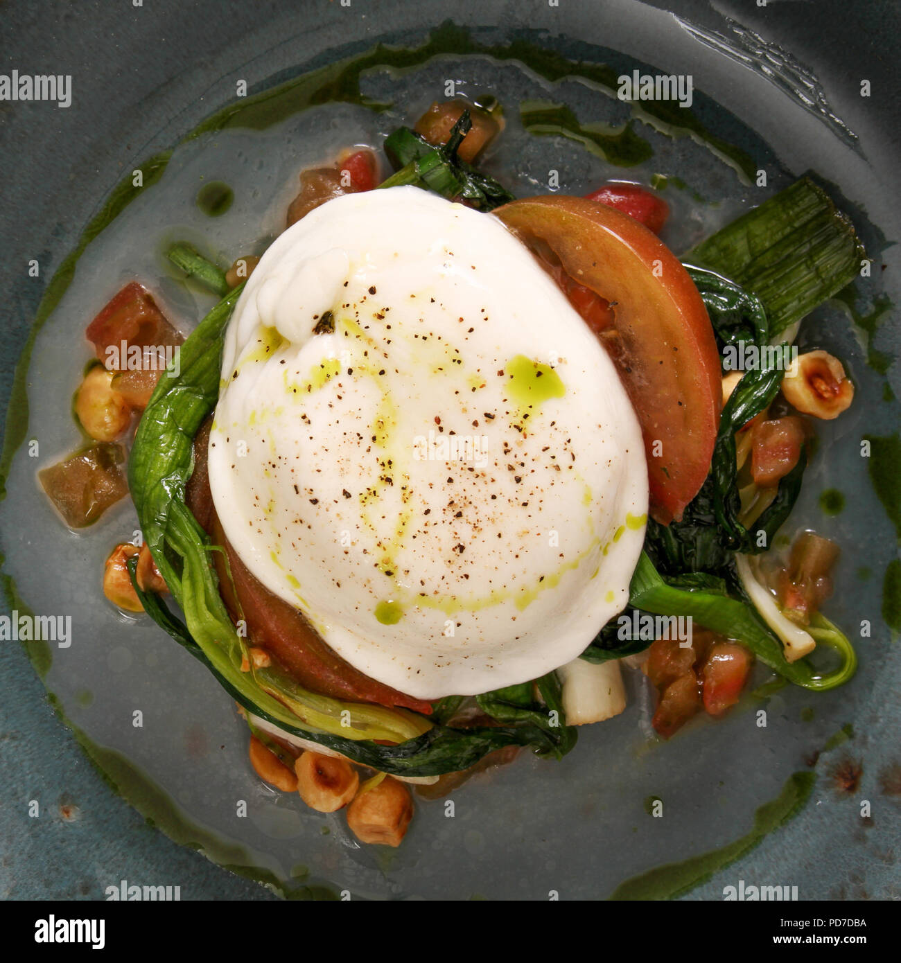 plated burrata cheese appetizer Stock Photo - Alamy