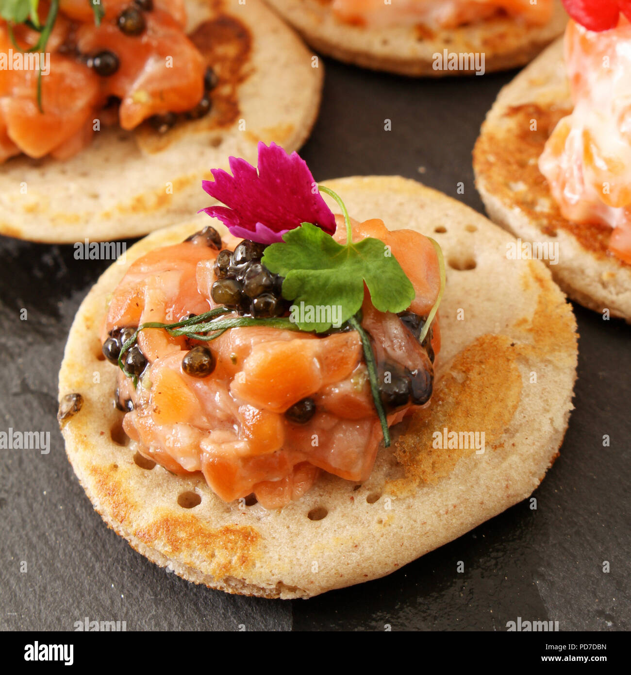 smoked salmon blinis canapes Stock Photo - Alamy