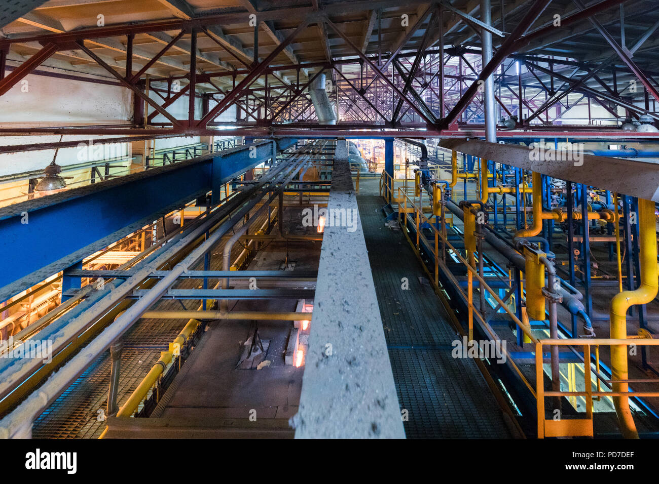 Fiberglass production industry equipment at manufacture background ...