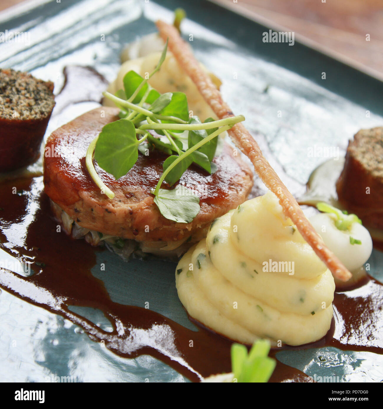plated pork meal Stock Photo - Alamy