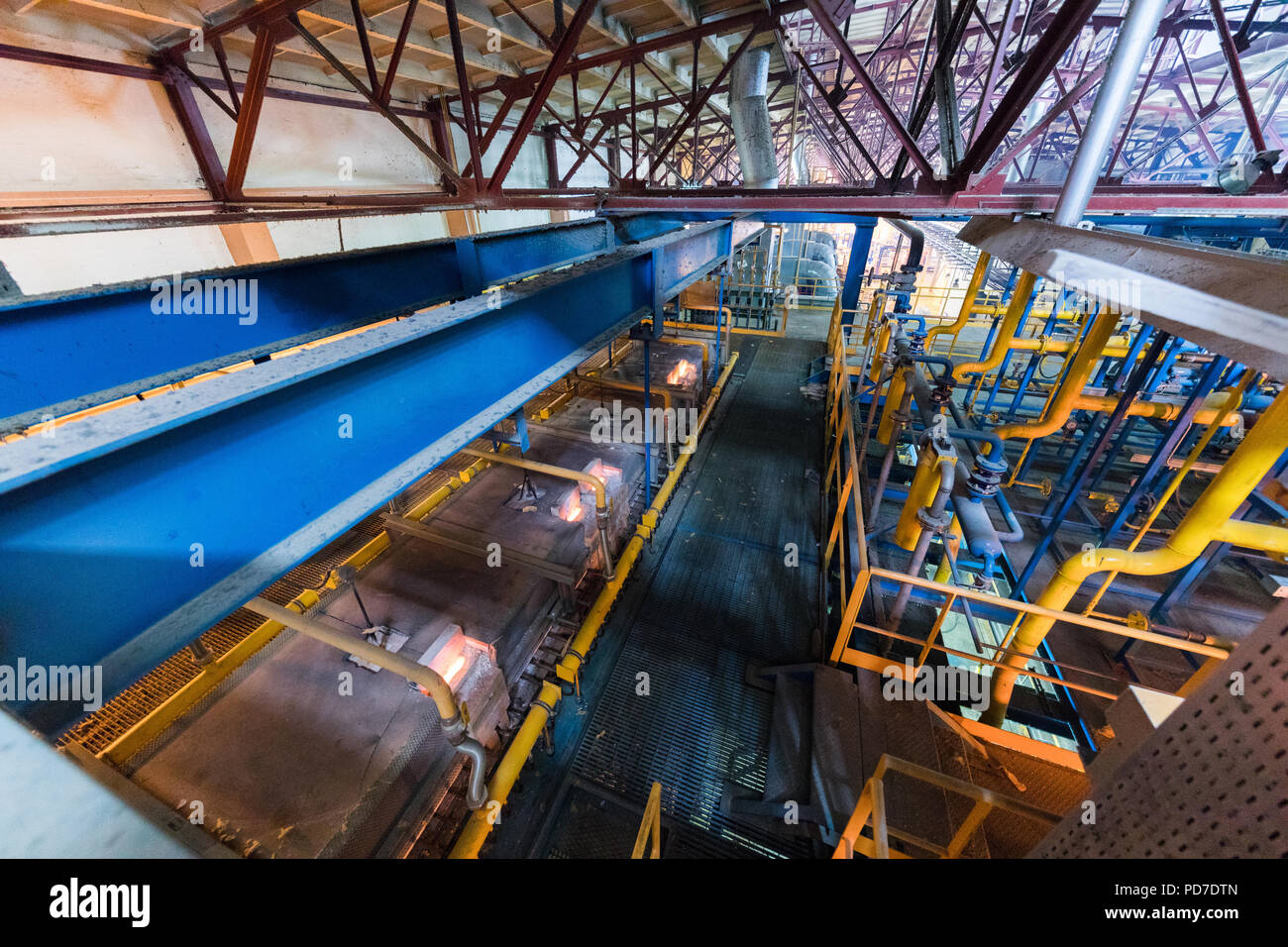 Fiberglass production industry equipment at manufacture background ...