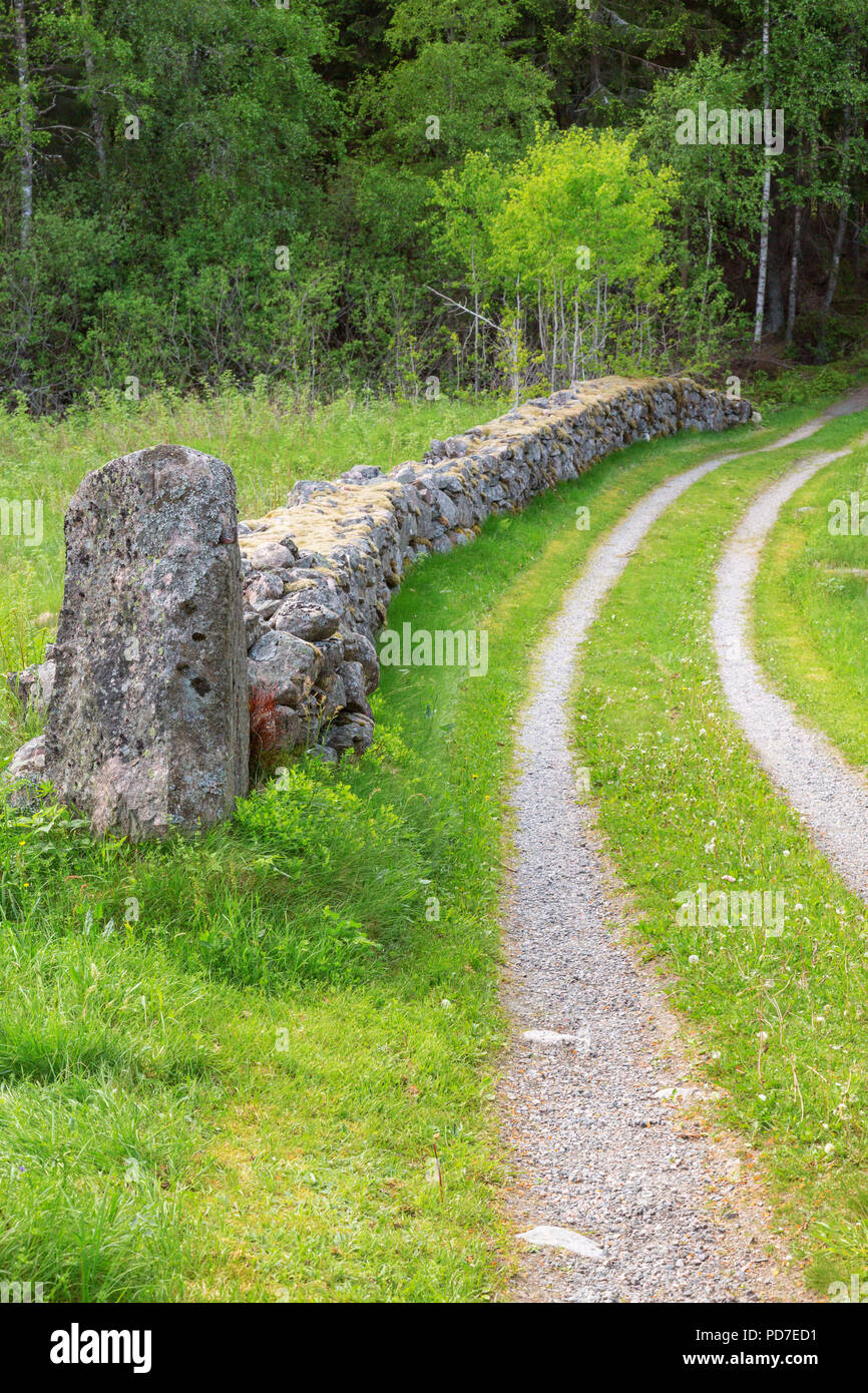 Gravel road with stone walls hi-res stock photography and images - Alamy
